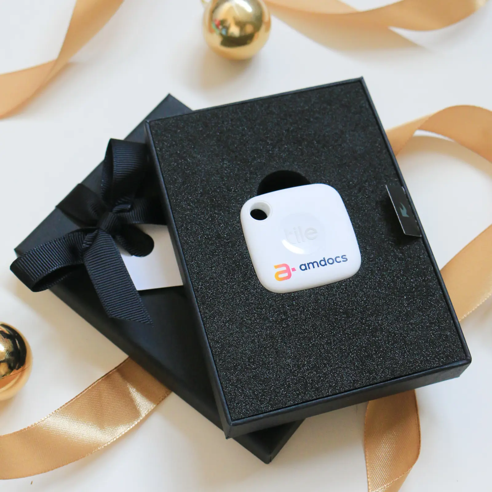 The Versatile Branded Tile Tracker For Keys, Bags And More